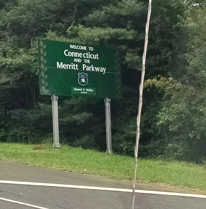 This unassuming green sign marks the gateway to one of America's most beautiful highways&mdash;no spoiler alerts needed.