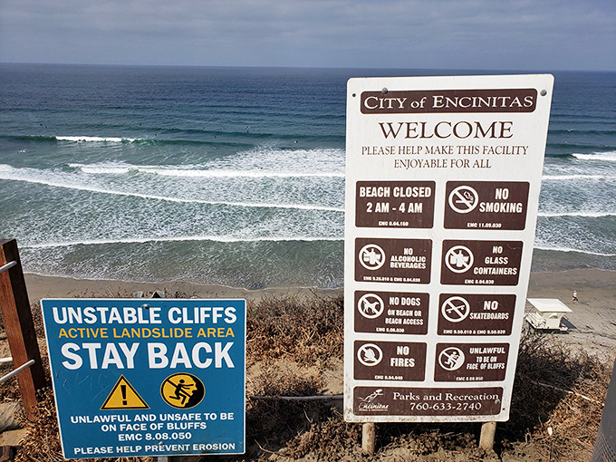 Warning signs that somehow make this beach even more enticing – nature's way of saying "the best views require a bit of caution."