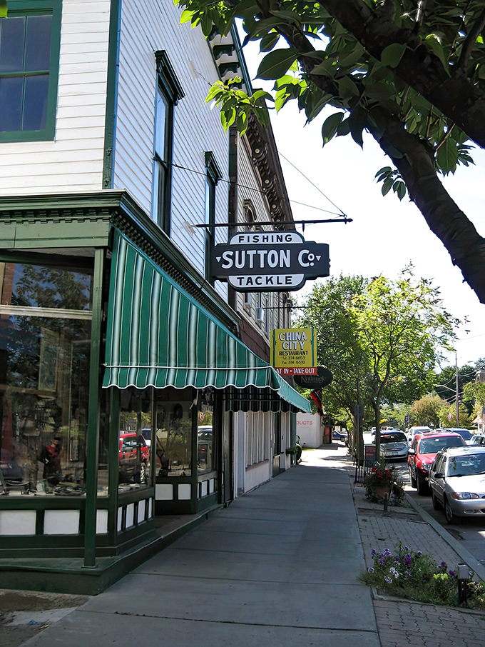 Time stands still at Sutton Co., where the vintage fishing tackle sign reminds us some treasures can't be found on Amazon—only in small towns like Naples.
