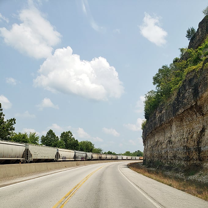 The dramatic limestone bluffs along Highway 19 reveal the geological story of the region, reminiscent of Germany's Rhine Valley.
