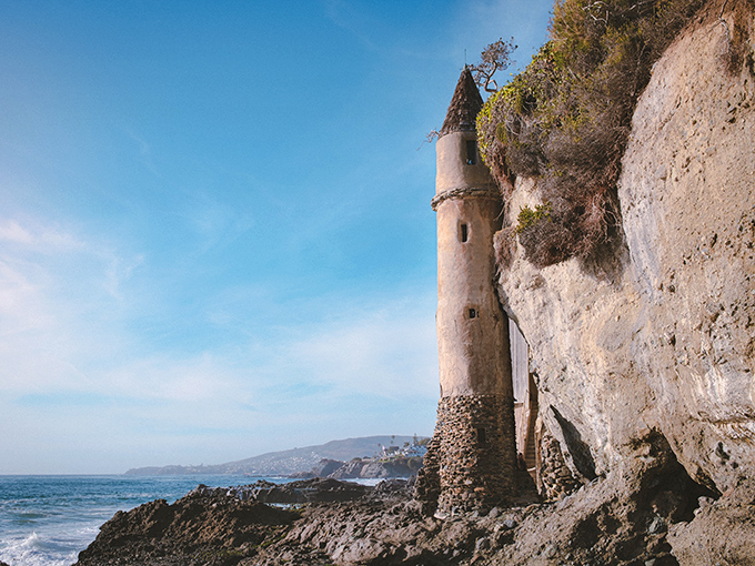 The tower's slender silhouette against Laguna's coastline looks like someone dropped a piece of European history into California's perfect postcard.