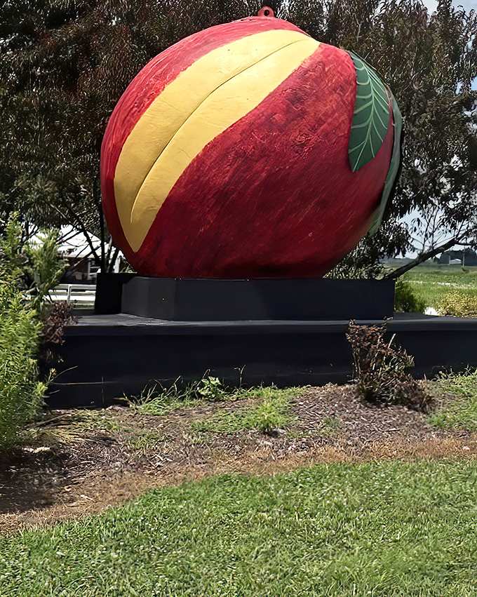 From this angle, you can appreciate the artistry&mdash;that perfect yellow slice and jaunty green leaf make this no ordinary roadside giant.