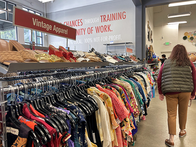 A rainbow of vintage possibilities hangs in perfect formation, like a fashion time machine ready to transport you to any decade.