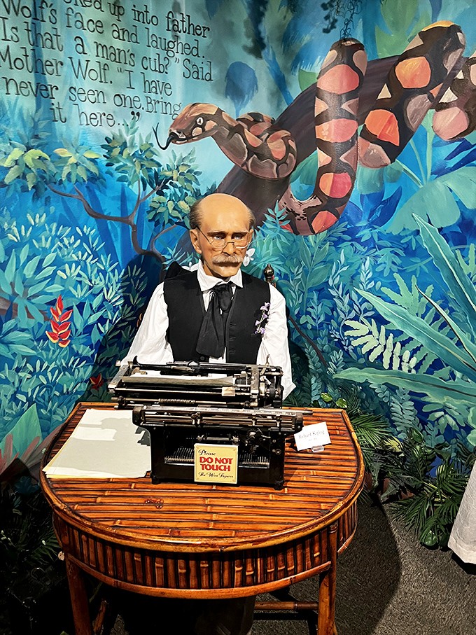 Rudyard Kipling sits eternally at his typewriter, probably contemplating whether the museum's "Do Not Touch" signs are just another jungle law to test.