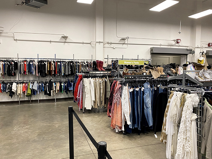 Rows upon rows of carefully organized clothing create a rainbow road of fashion possibilities, where yesterday's trends await their comeback moment.