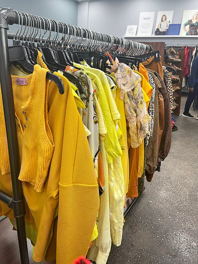 Sunshine in fabric form! This golden-hued clothing rack proves yesterday's fashion castoffs become tomorrow's statement pieces with just a little patience.