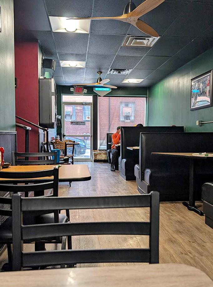 Step inside where bright walls and cozy booths create that perfect diner vibe that makes everything taste better somehow.