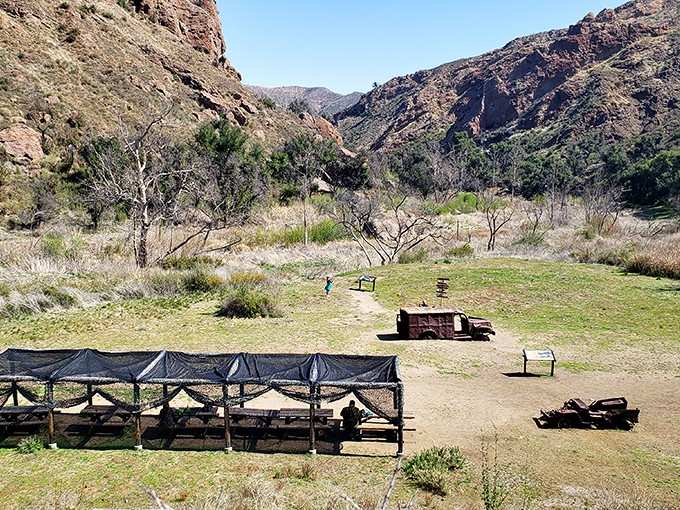 Picnic tables, shade structures, and towering canyon walls create the ultimate outdoor dining room for sandwiches that taste better al fresco.