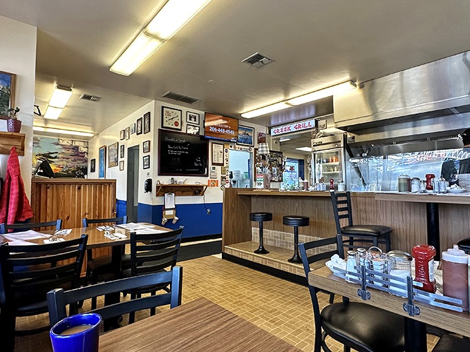 Step inside and time politely stands still. Blue walls, wood paneling, and zero pretension—just the way a proper diner should dress for success.