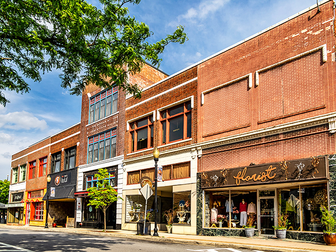 Altoona's historic downtown beckons with red brick warmth, where every storefront tells a railroad town story.