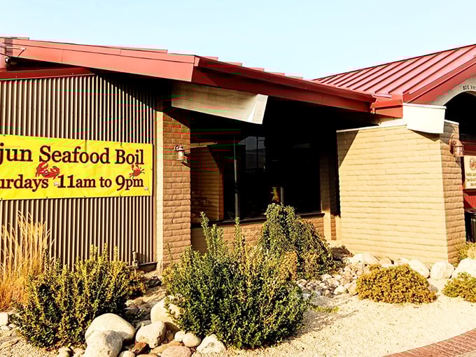 BJ's Barbecue announces itself with a sign that promises Cajun seafood boils &ndash; a delicious plot twist to their BBQ story!