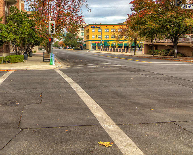 Bakersfield&rsquo;s downtown streets offer a peaceful blend of city life and seasonal color, where autumn leaves soften the urban edges.
