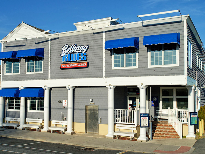Those blue awnings match the ocean vibes perfectly &ndash; beach hair meets barbecue sauce, my favorite combo! 