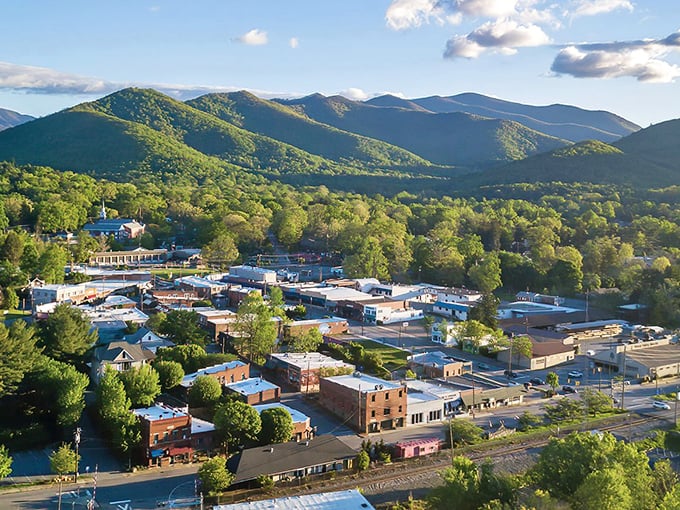 Bird's eye bliss! Black Mountain nestles between rolling peaks like nature's perfect cradle, complete with a downtown straight from a storybook.