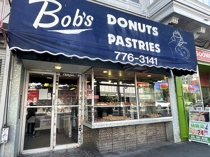 Bob's blue awning beckons donut devotees day and night. A San Francisco institution where calories don't count.