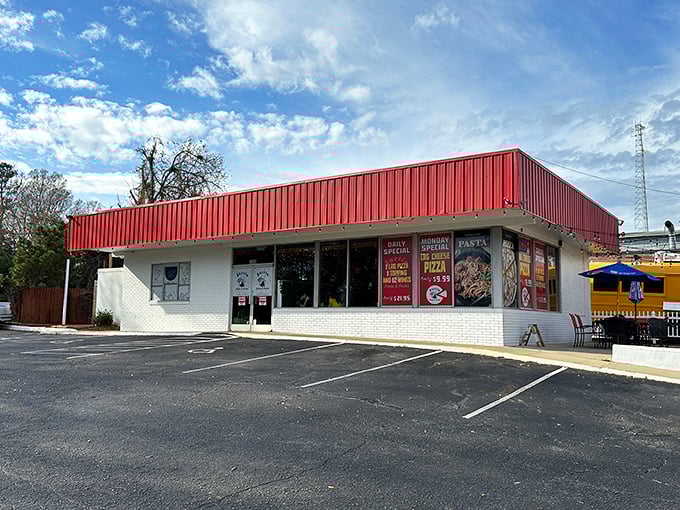 No frills, just thrills! Bussin Pizza's bold red building houses treasures that prove you should never judge a pizzeria by its cover.