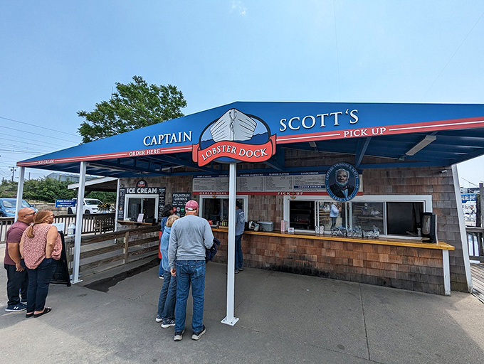 Captain Scott's blue awning beckons seafood lovers like a lighthouse guides ships&mdash;straight to lobster nirvana.