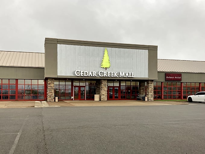 Cedar Creek Mall welcomes shoppers with its rustic stone entrance and iconic green pine tree logo. No red carpet needed when the deals are this good!