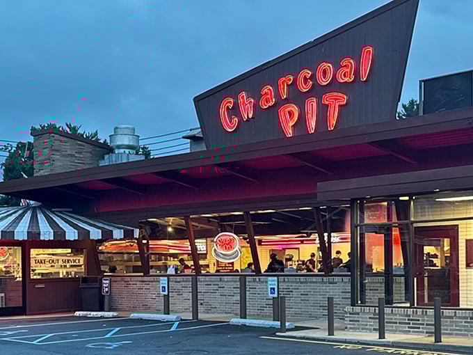 That unmistakable red glow signals serious comfort food ahead in downtown Wilmington.