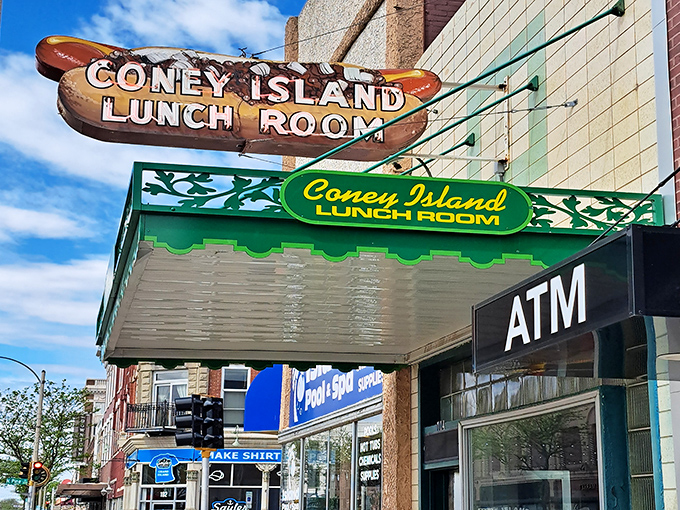 Coney Island Lunch Room's vintage hot dog sign has been stopping traffic for decades. Some traditions are worth preserving!