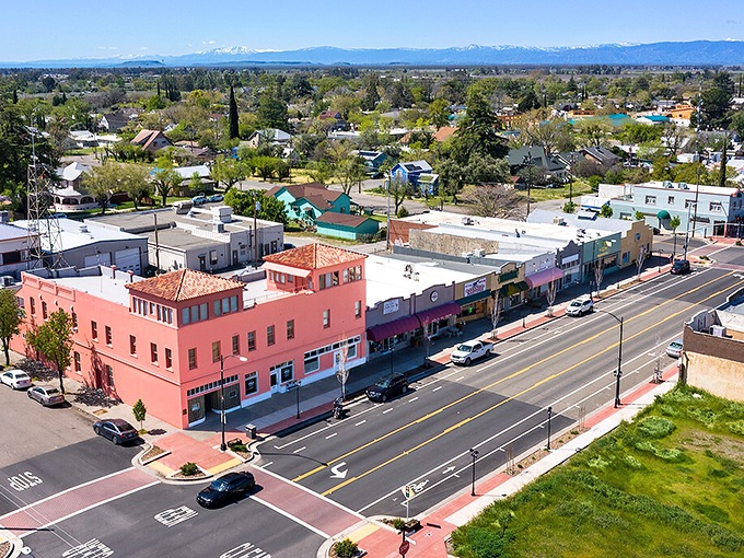 Small-town charm meets snow-capped vistas! Corning's terracotta buildings whisper "slow down" to budget-conscious retirees.