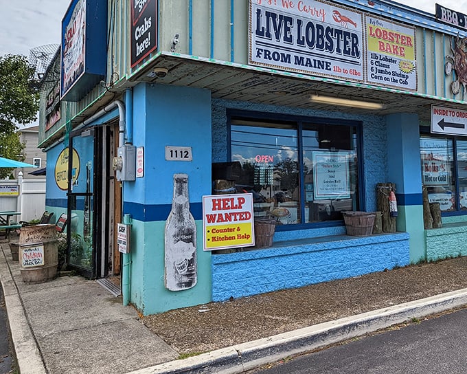 That bright blue paint job isn't trying to blend in - it's announcing to the world that fresh lobster and serious crab business happens here.