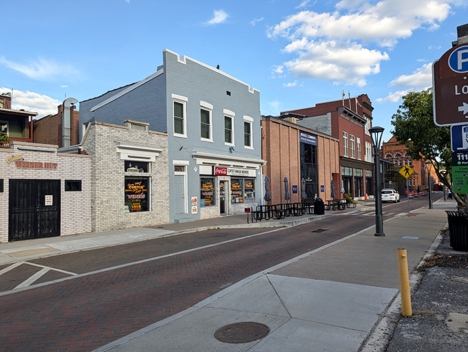Downtown Cumberland's historic charm provides the perfect backdrop for Curtis Famous Weiners, where hot dog tradition lives on in blue-painted splendor.