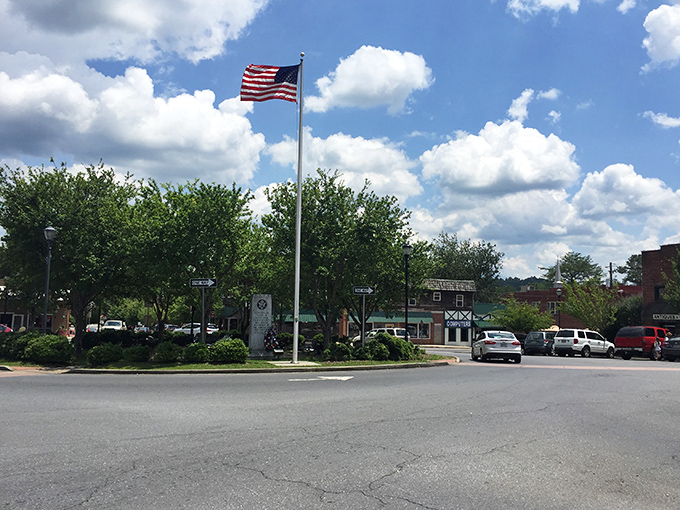 Ellijay's town center proudly flies Old Glory, standing tall as the apple capital of Georgia with mountains as its backdrop.