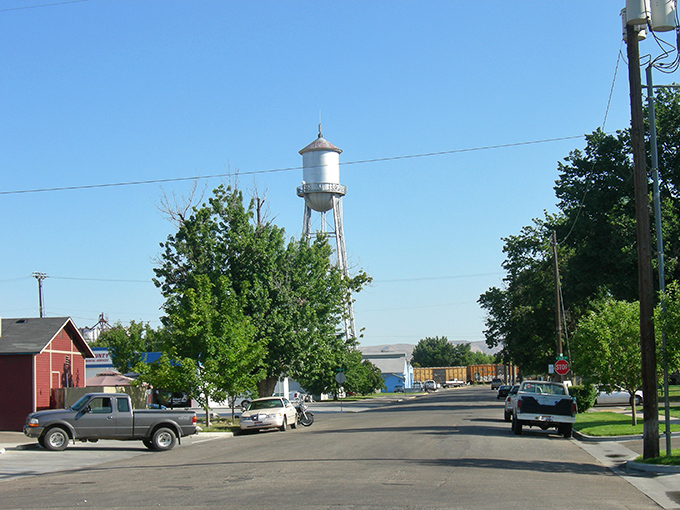 Emmett's iconic water tower watches over a town where your dollar stretches further than your imagination. Classic small-town America at its most affordable.
