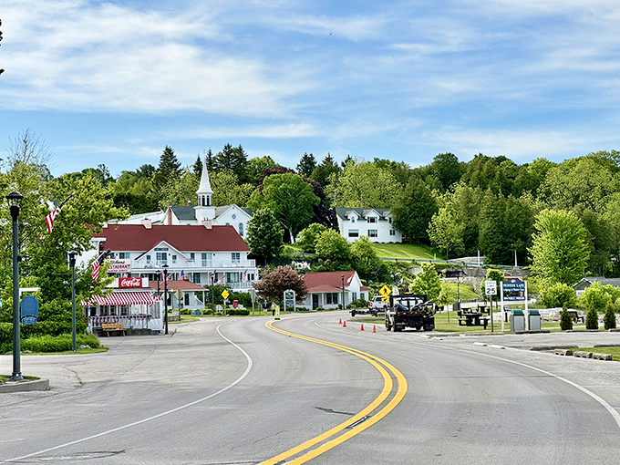 Church steeples and cherry blossoms! Ephraim's postcard-perfect curve reveals a Door County dreamscape where white buildings pop against Wisconsin blue like whipped cream on pie.
