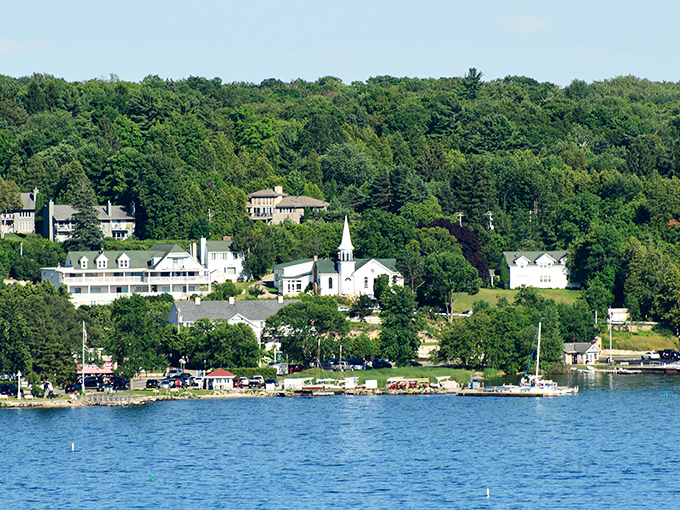 Ephraim's white church steeple rises above the trees, a postcard-perfect scene against Wisconsin's blue waters.