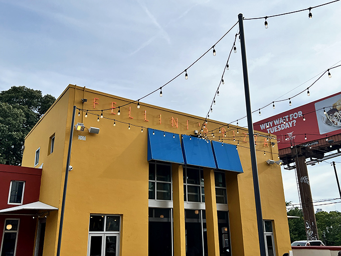 That golden building practically glows with pizza promise - a beacon for hungry souls everywhere. 