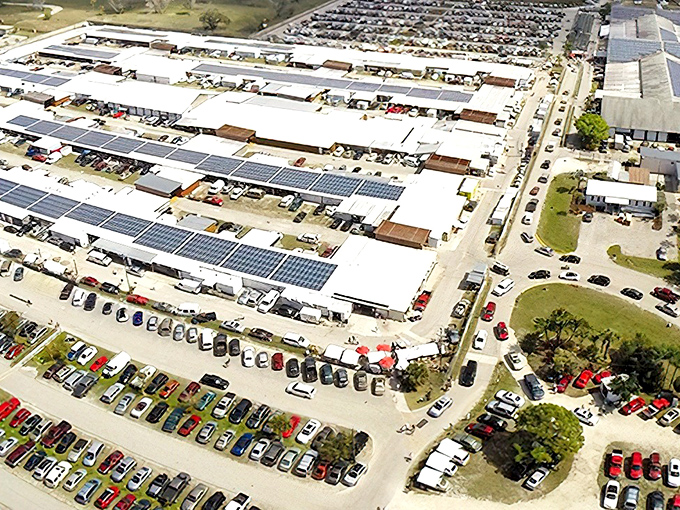 Solar-powered bargain hunting! Fleamasters' gleaming rooftops shelter a small city of vendors and treasures below.