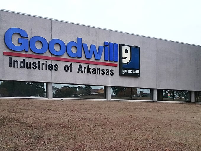 The Goodwill headquarters building stretches wide, holding more secondhand surprises than a game show warehouse.