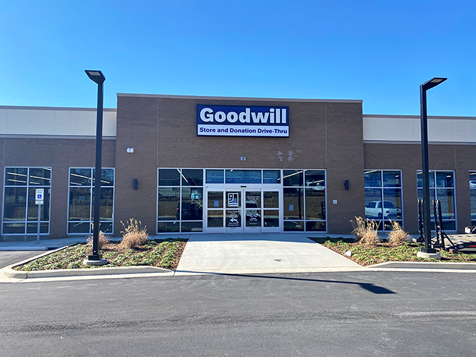 Modern brick meets thrift store magic - Goodwill's sleek exterior promises organized bargain hunting adventures within.