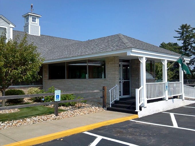 Granite Steak & Grill welcomes hungry travelers with its classic New England charm. That covered porch practically says "come sit a spell."
