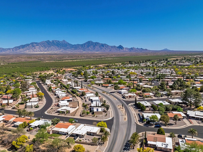 A patchwork of desert homes with mountains standing guard. Like living in a painting that changes colors with the seasons.