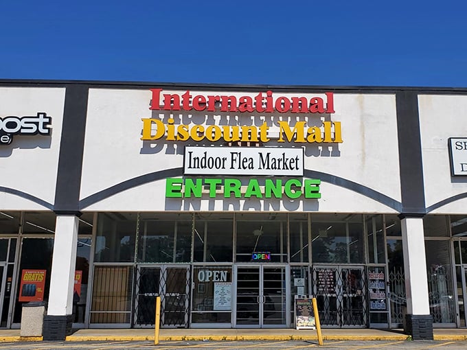 The International Discount Mall entrance promises global treasures behind those colorful, welcoming doors waiting inside.