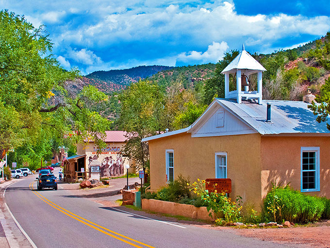 Jemez Springs' church spire reaches skyward, a spiritual sentinel amid red rock canyons that whisper stories of ancient peoples.