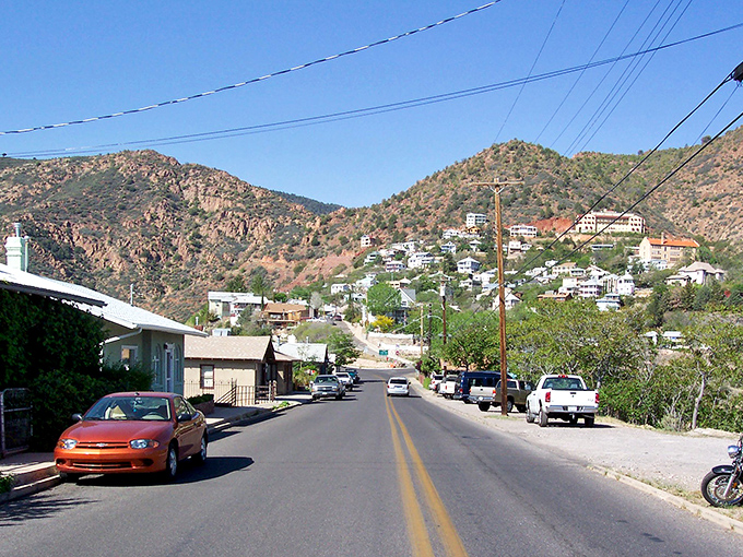 Jerome's steep streets cling to Cleopatra Hill, defying gravity with the confidence of a town that's survived everything.