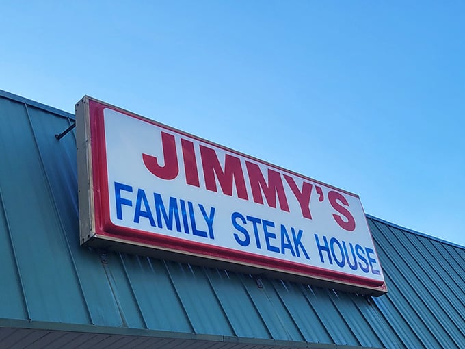 Jimmy's bold red sign stands as a beacon for steak lovers. Like finding a treasure map where X marks the spot for perfect ribeyes.