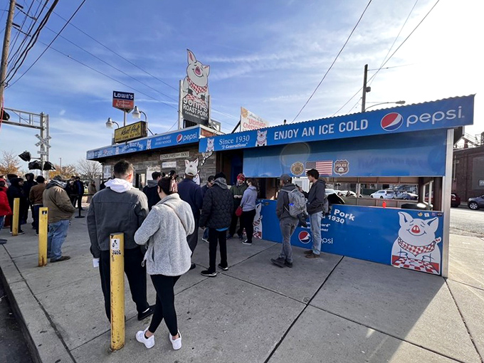 That cheerful pig sign isn't kidding around. The blue exterior stands out like a delicious mirage in an industrial landscape.
