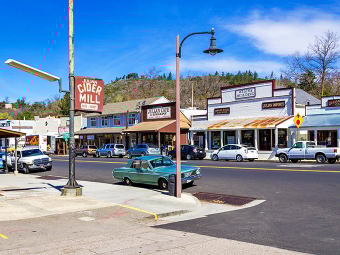 The Cider Mill sign welcomes visitors to Julian's charming downtown. Where time slows down and apple-everything becomes your new obsession.
