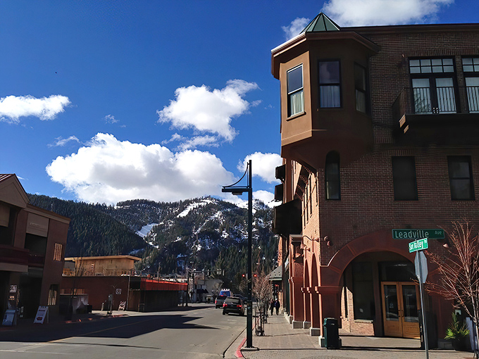 Ketchum's brick buildings and mountain backdrop create that perfect "Aspen meets authenticity" vibe that money can't quite buy elsewhere.