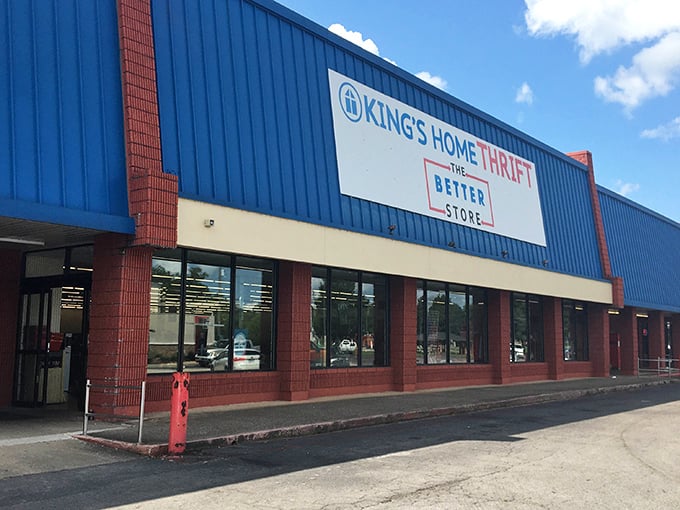 This blue and brick beauty stands ready like a friendly giant, welcoming bargain hunters with open arms.