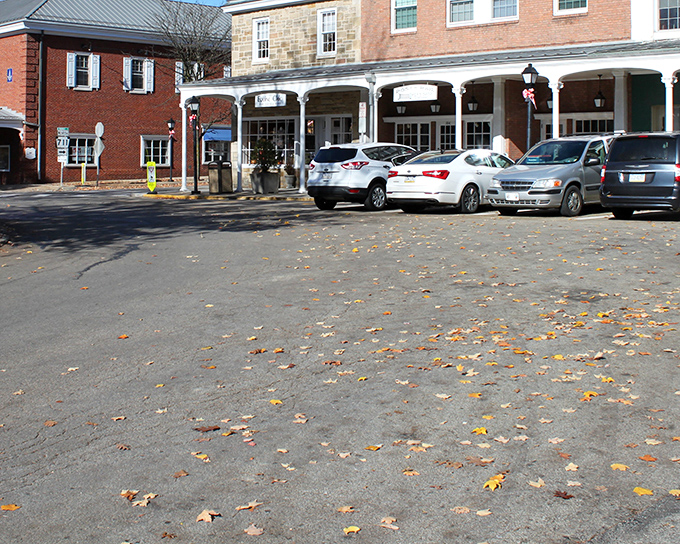 Behold the town diamond where autumn leaves create nature's confetti for this Westmoreland County masterpiece.