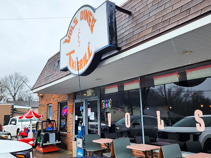 Lil Vols Diner's distinctive orange sign stands out like a beacon for hungry travelers passing through Rocky Top.