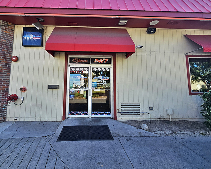 The Lucky Beaver's entrance promises 24-hour burger satisfaction. When hunger strikes at midnight, this red-roofed savior answers the call!