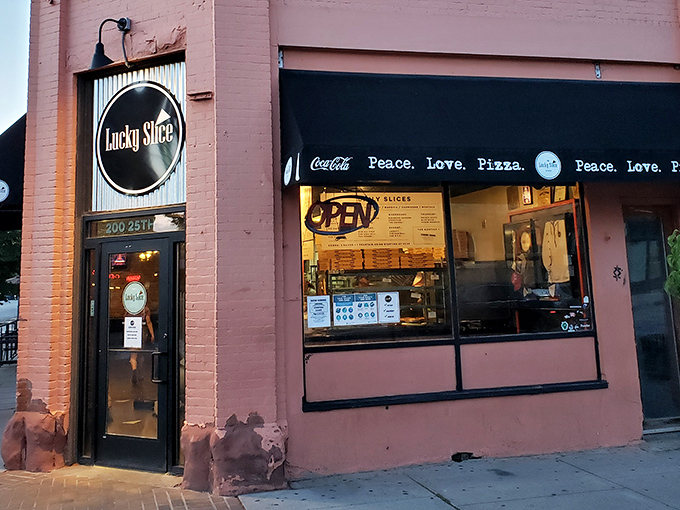 That "Peace. Love. Pizza." window message says everything you need to know about this place's soul.