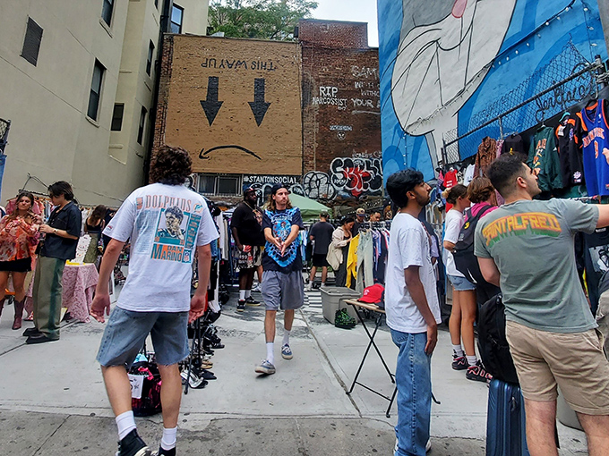 Urban treasure hunting at its finest! Ludlow Flea transforms this alleyway into a vintage t-shirt paradise where yesterday's logos find tomorrow's owners.